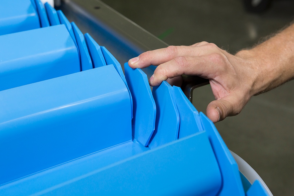 Move Products Vertically & Sanitary with the New AquaPruf Conveyor